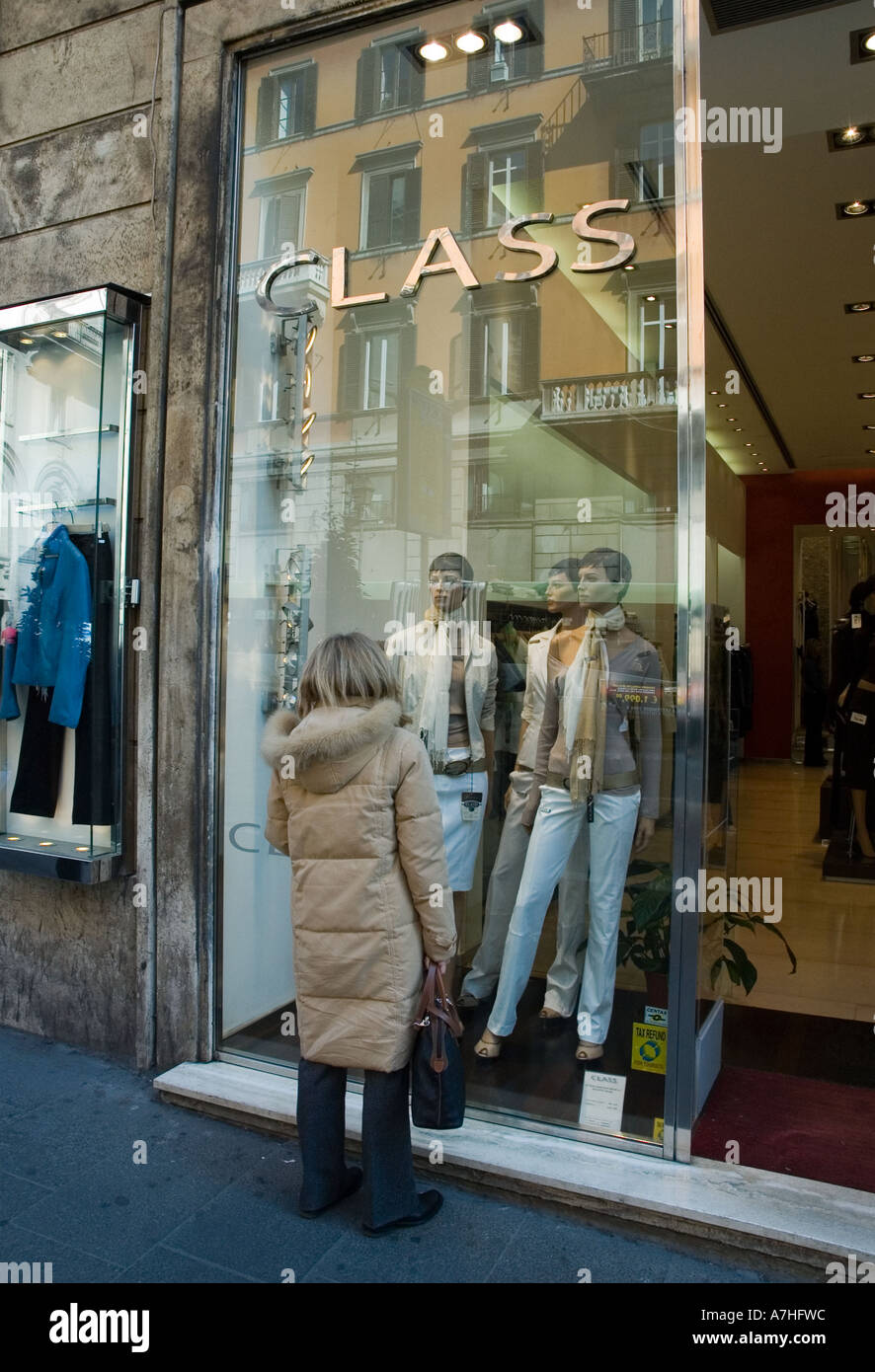 Women looking in thw window of a clothes shop called Class in Rome ...