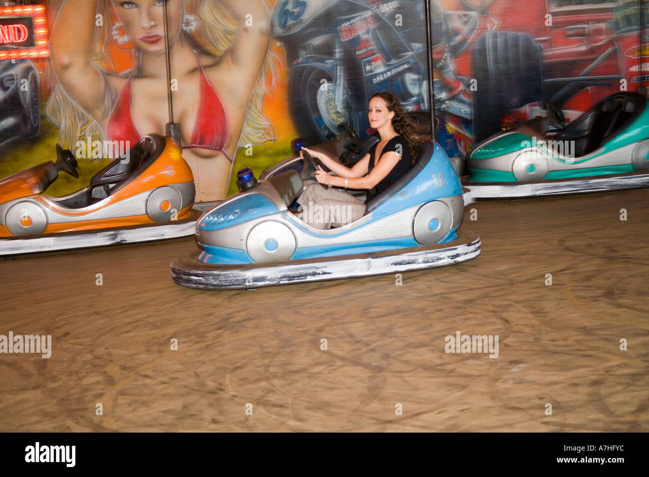 Riding the dodgems in the fun fair on Central Pier,Blackpool,Lancashire ...