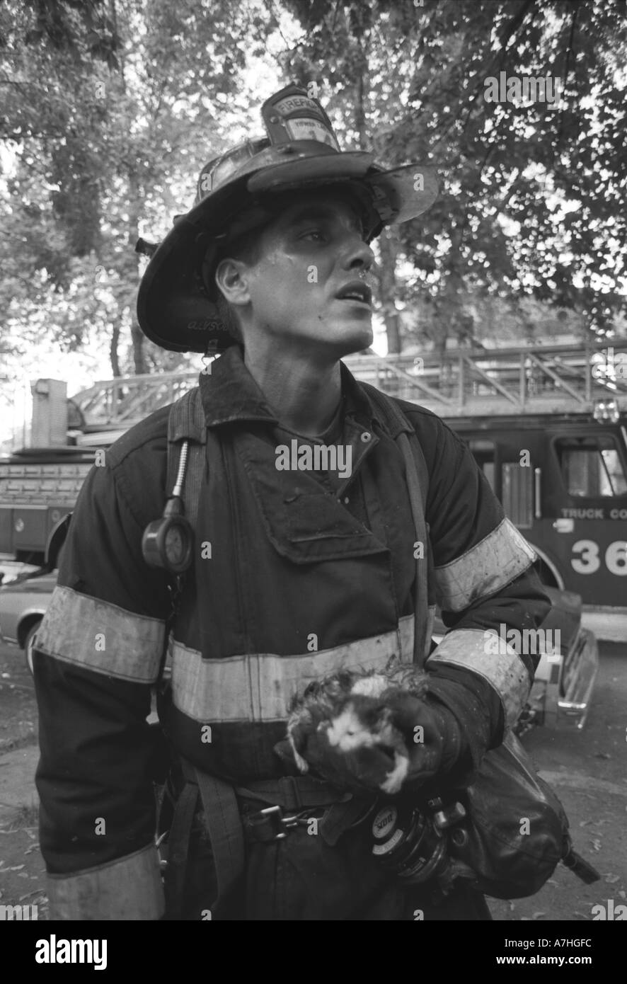 USA, Illinois, Chicago, 11th District, fireman at burning house Stock ...