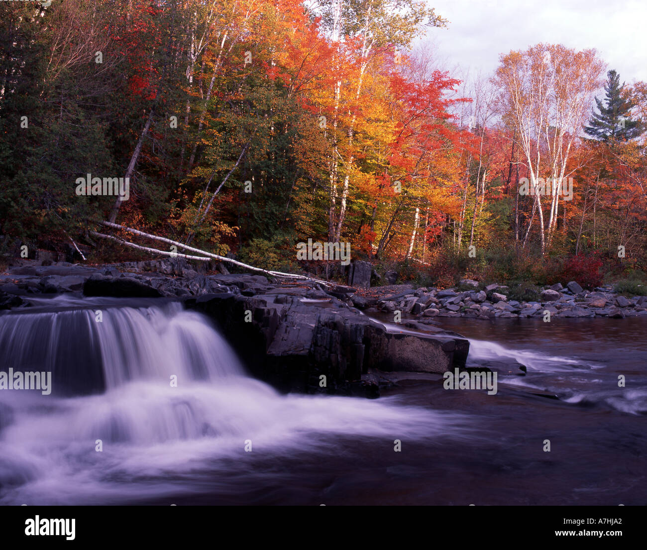 Waterfall on Big Wilson Stream, fall foliage, near Monson, Maine Stock ...