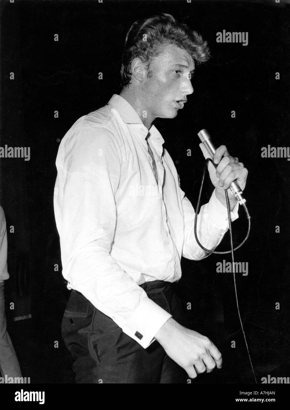JOHNNY HALLIDAY - French pop singer - here about 1960 Stock Photo - Alamy