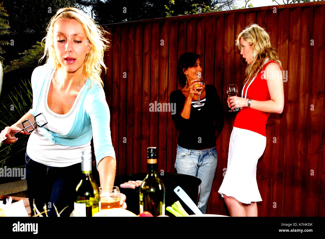 Young Women Having a Barbeque Models Released Stock Photo - Alamy