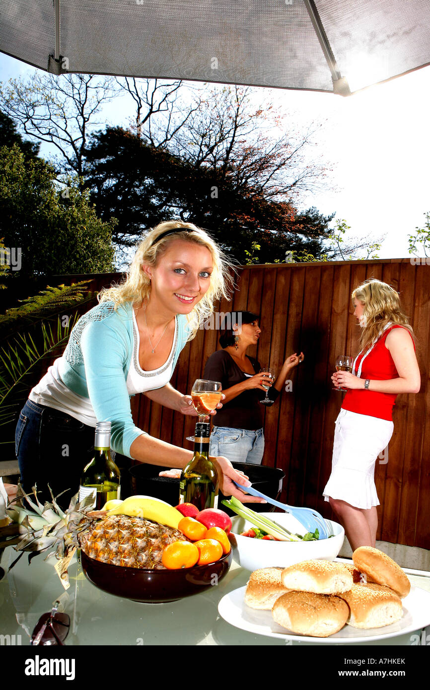 Young Women Having a Barbeque Models Released Stock Photo - Alamy