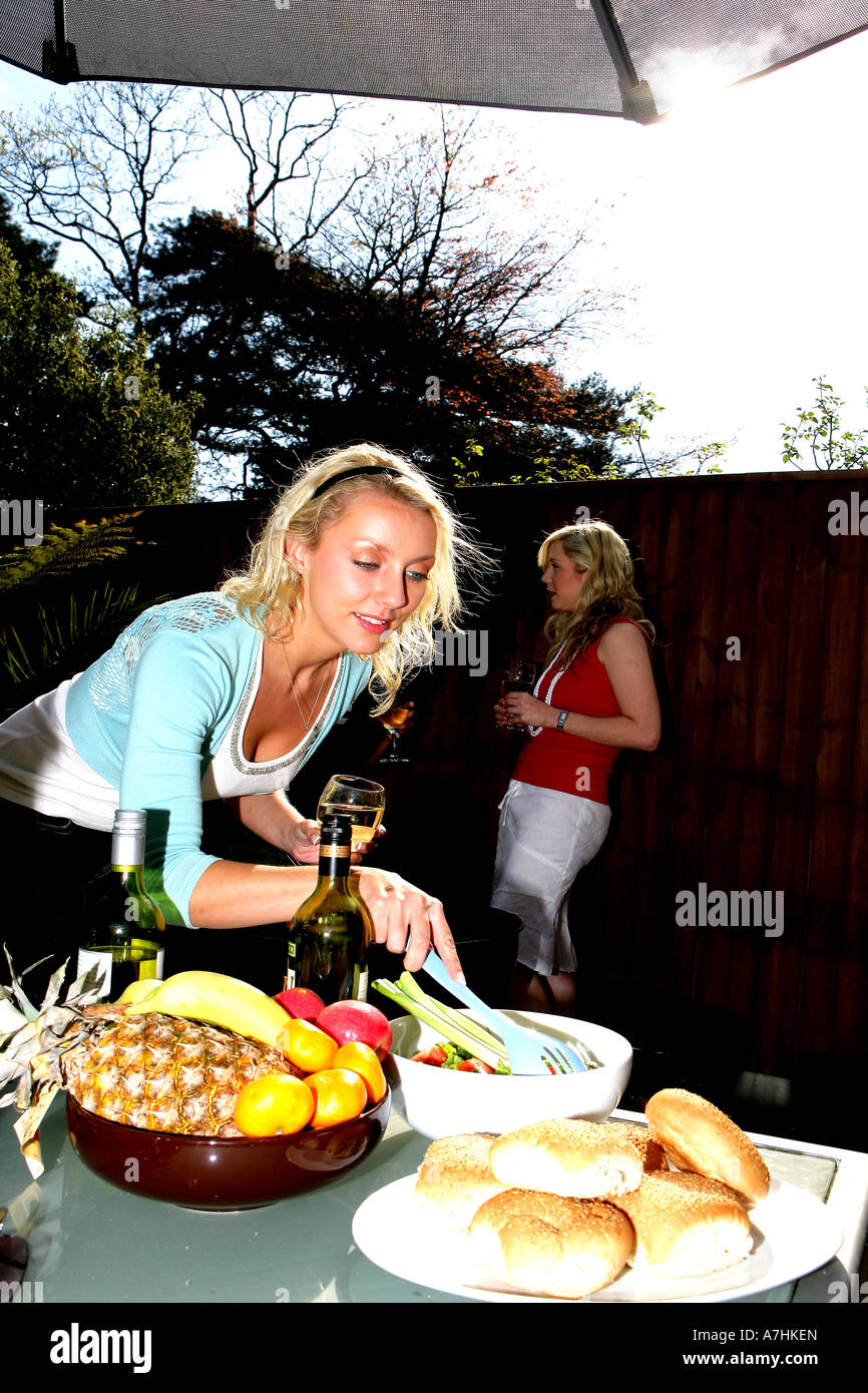 Young Women Having a Barbeque Models Released Stock Photo - Alamy