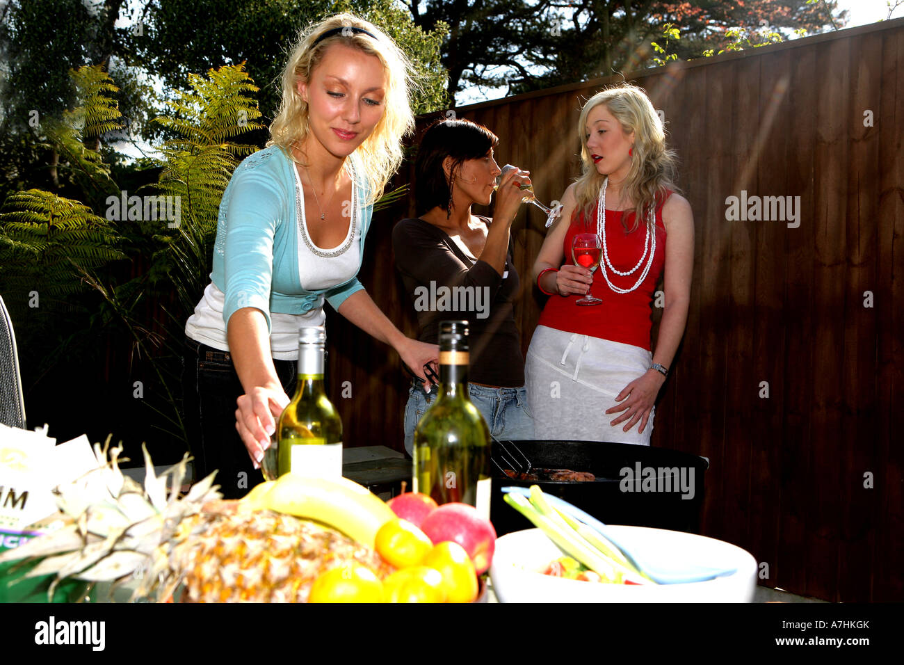Young Women Having a Barbeque Models Released Stock Photo - Alamy