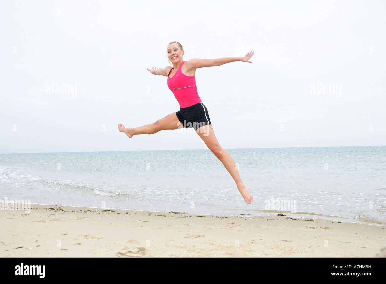 Young Woman Jumping Model Released Stock Photo - Alamy