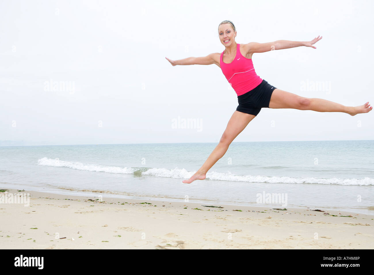 Young Woman Jumping Model Released Stock Photo - Alamy