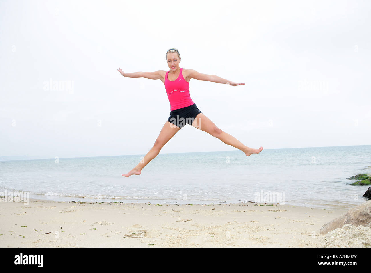 Young Woman Jumping Model Released Stock Photo - Alamy