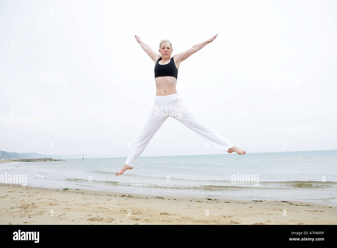 Young Woman Jumping Model Released Stock Photo - Alamy