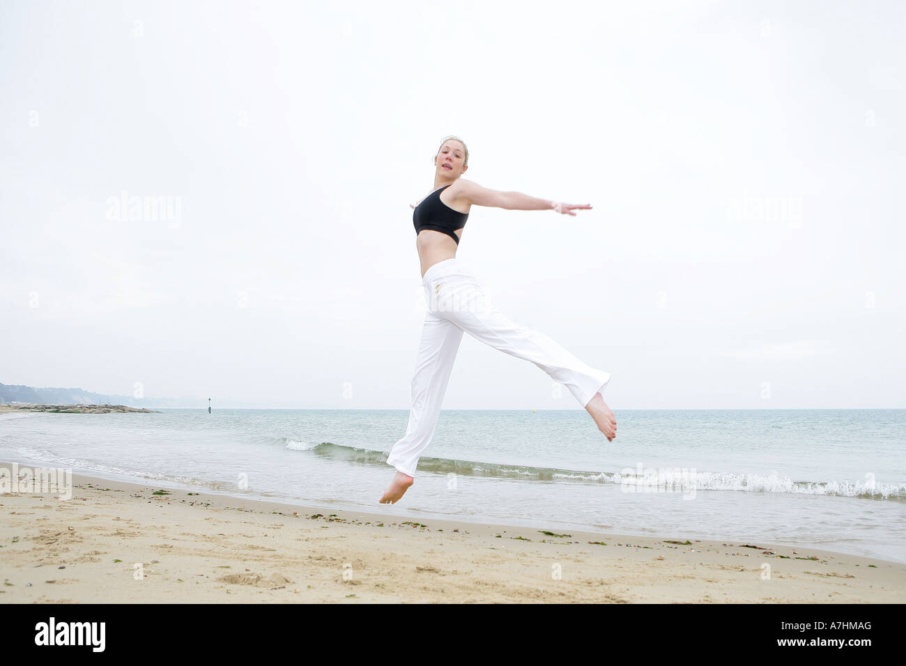Young Woman Jumping Model Released Stock Photo - Alamy