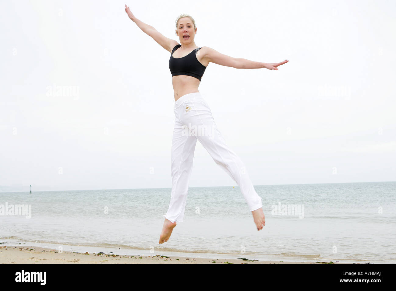 Young Woman Jumping Model Released Stock Photo - Alamy