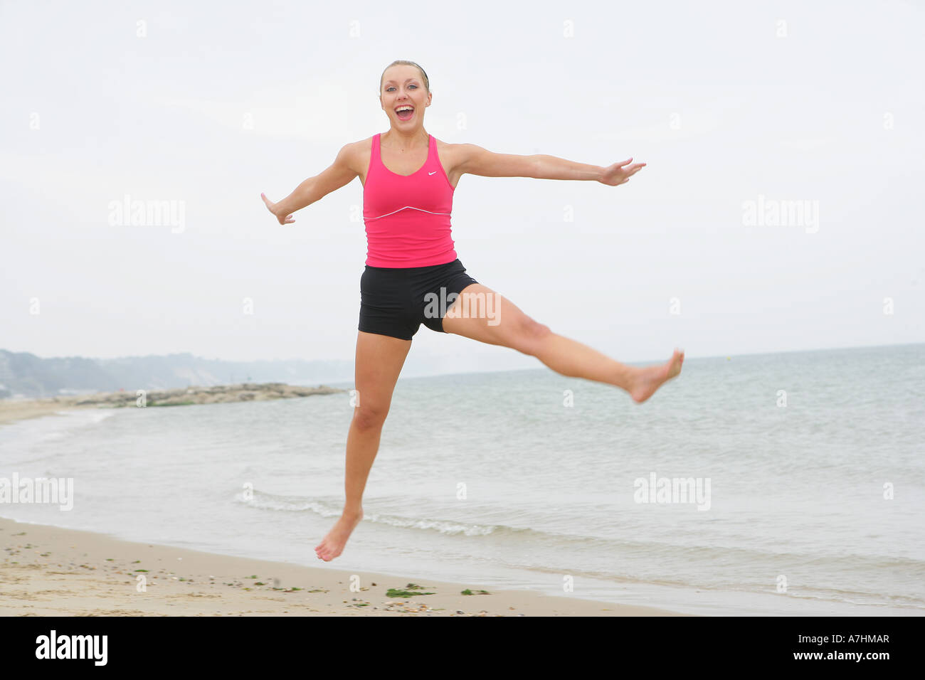 Young Woman Jumping Model Released Stock Photo - Alamy