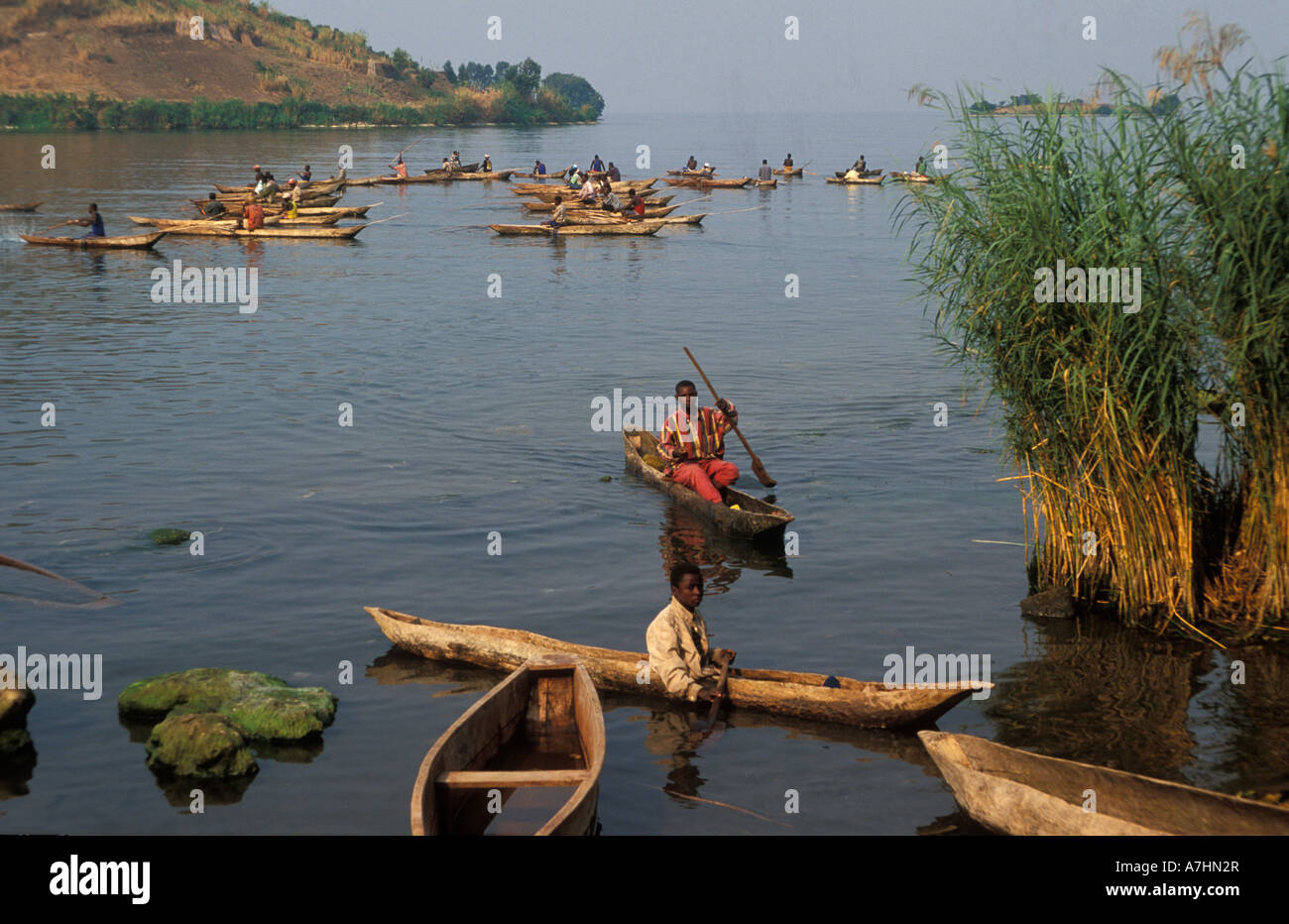 Fishermen in dugout canoes on Lake Kivu, Gisenyi, Rwanda Stock Photo ...