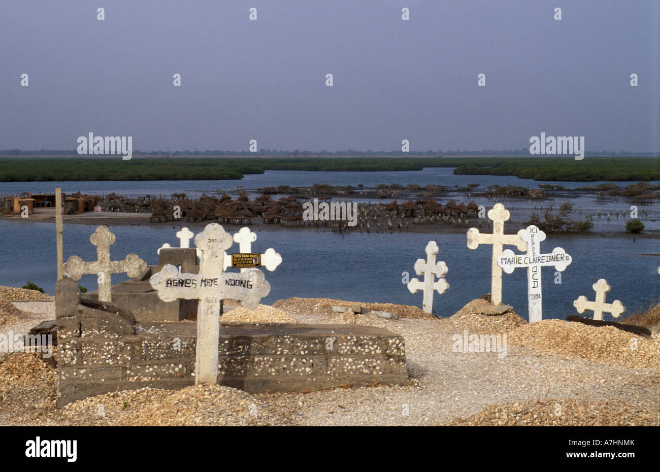 Island composed of shells with a Christian cemetery on a seperate shell ...