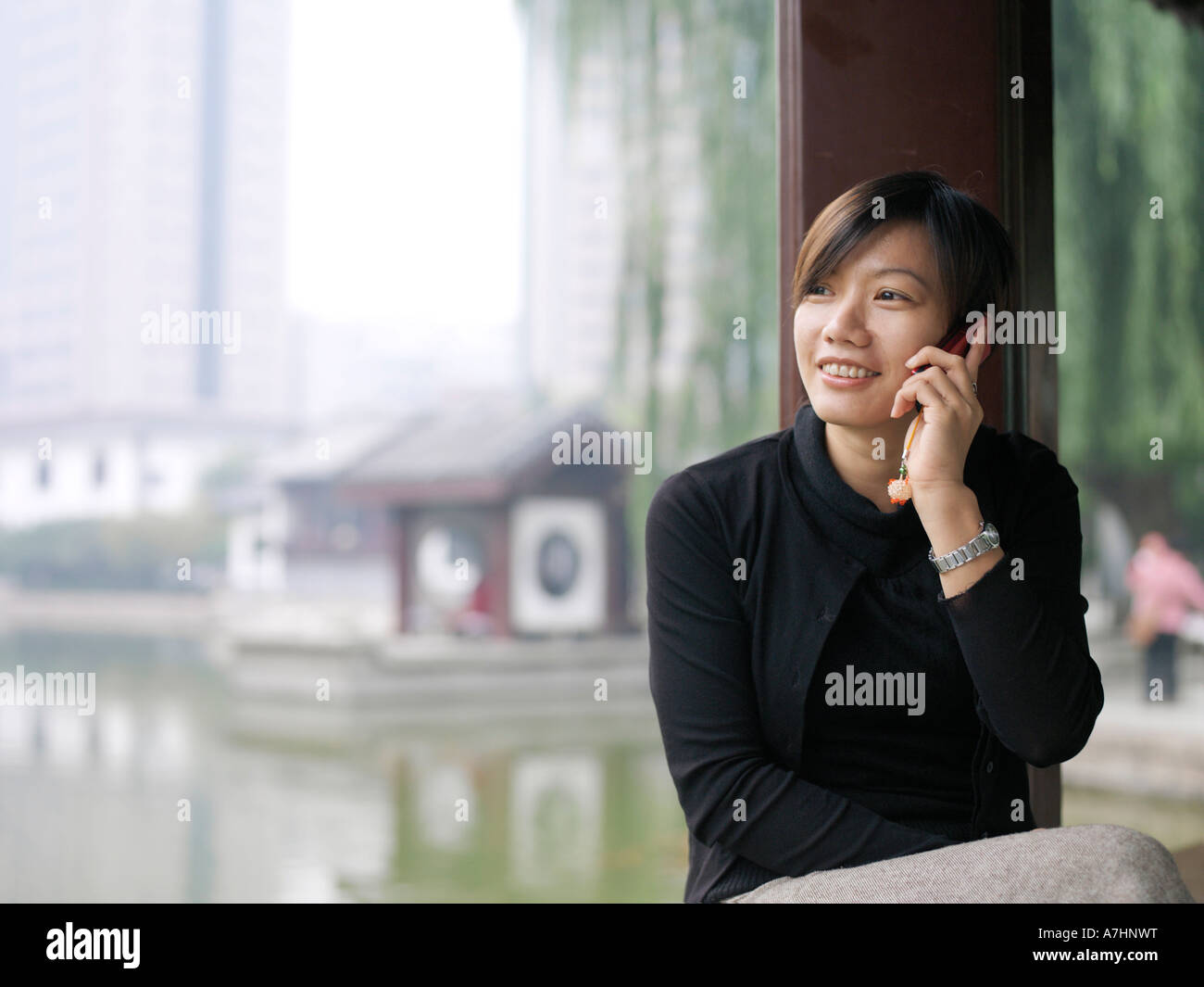 A young hip urban Beijing woman in a business suit Stock Photo - Alamy