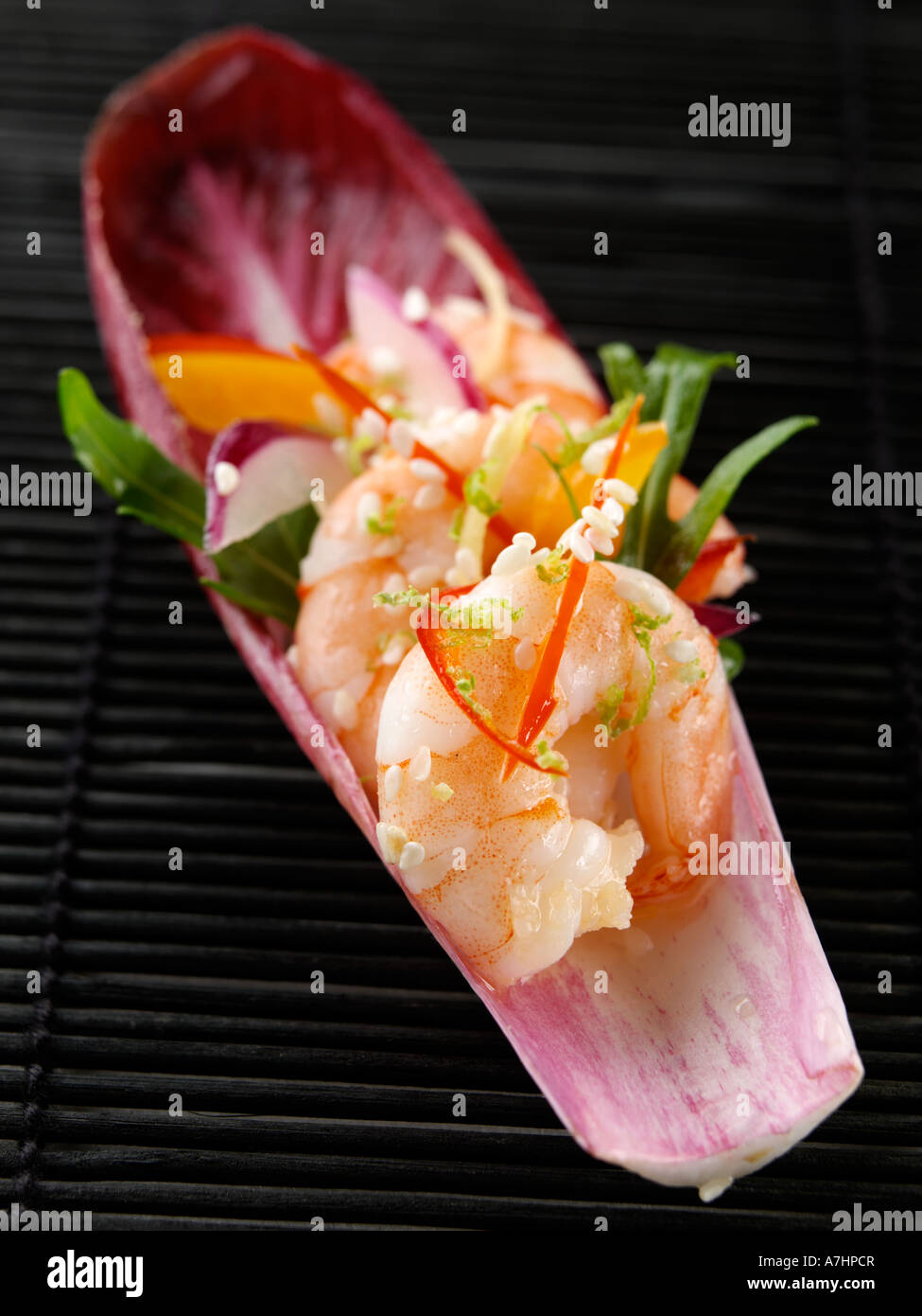 Gourmet canape marinated prawns radicchio leaf hi-res stock photography ...