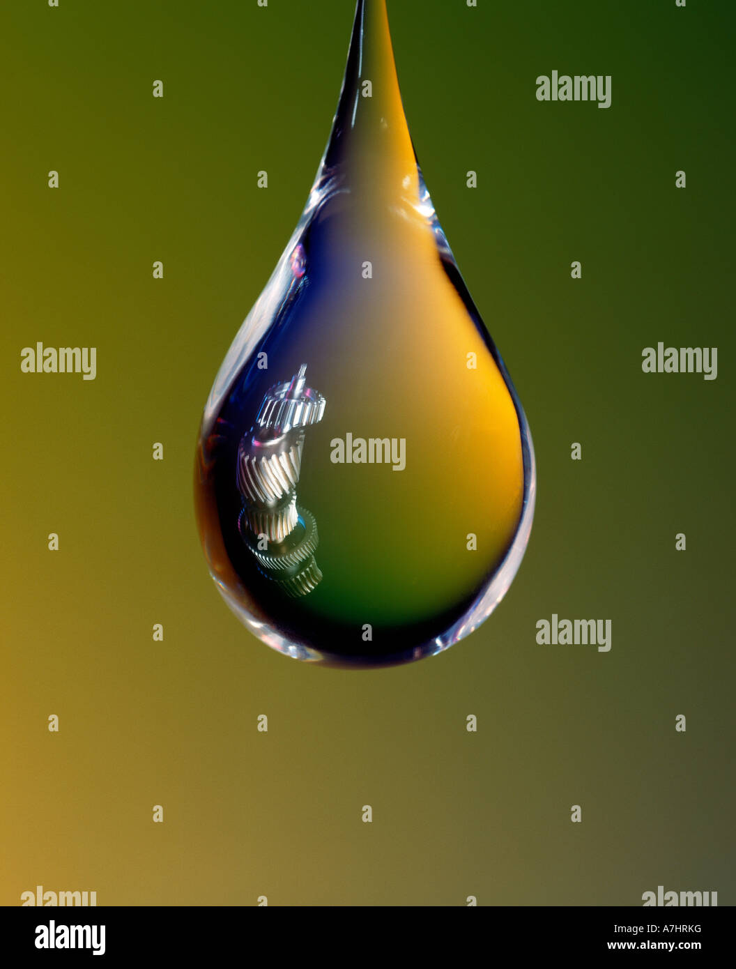 Oil Drop with Industrial Gears Reflection Stock Photo - Alamy