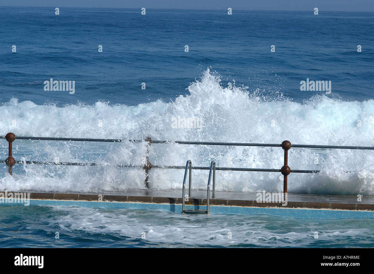 sea water swimming pool with waves crashing Stock Photo - Alamy