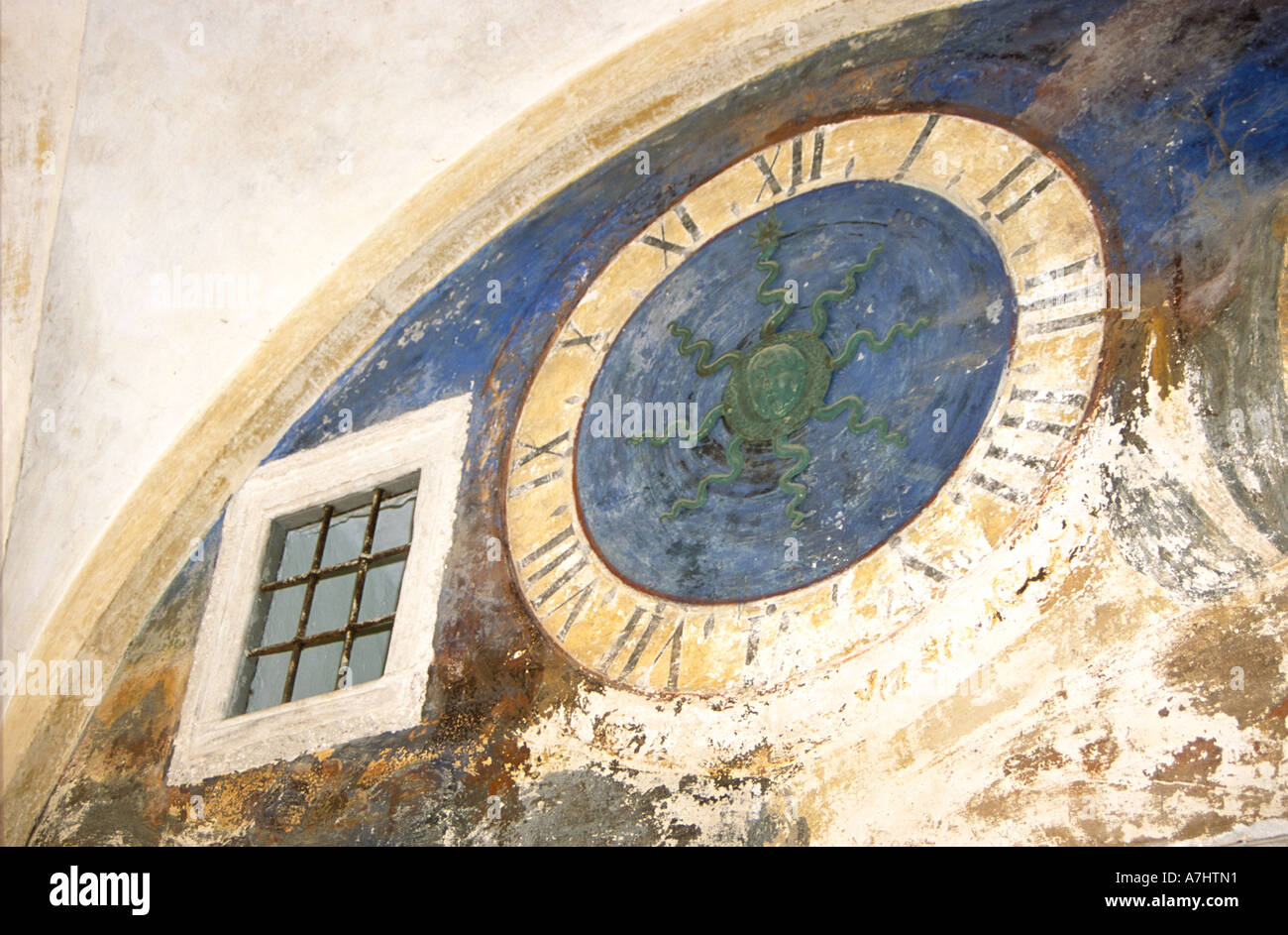 Franciscan Monastery, painting of clock beside window in the cloisters ...