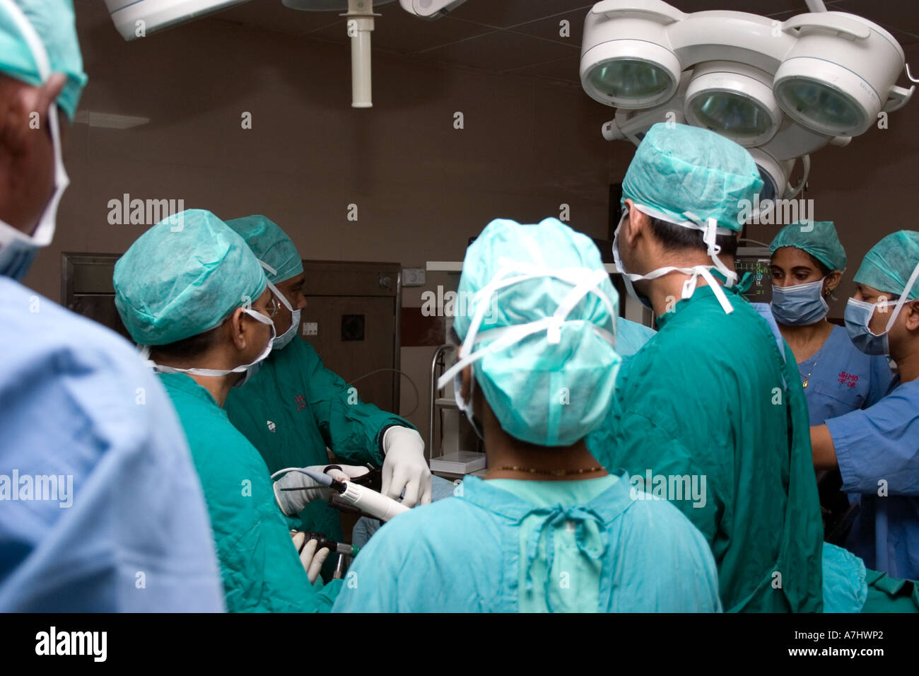 Doctor nurses perform surgery hi-res stock photography and images - Alamy