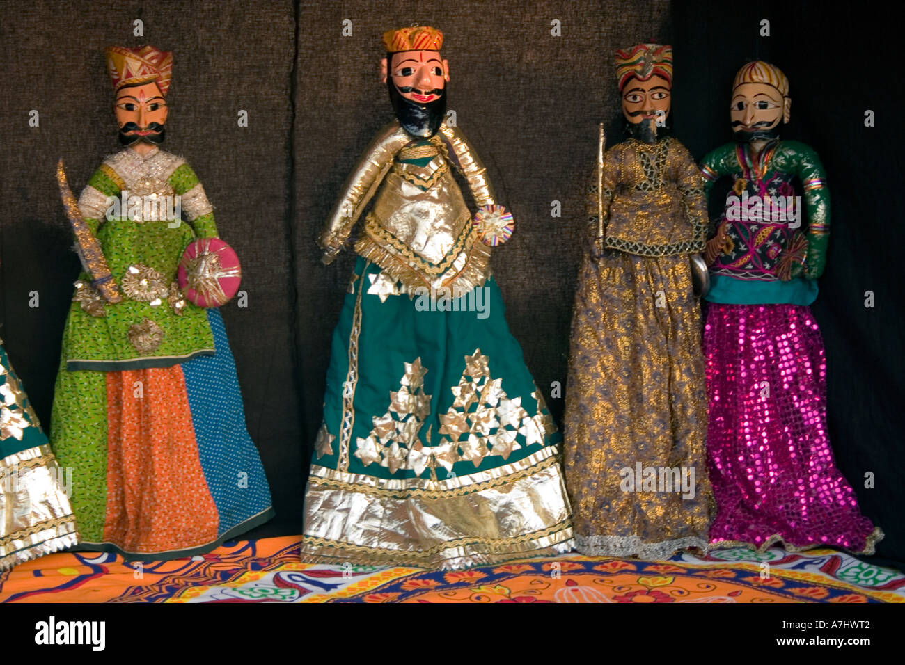 Hand-made puppets are arranged prior to the commencement of a ...