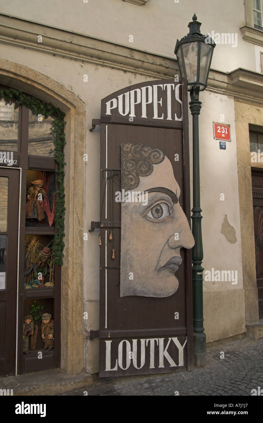 Door of Loutky puppet shop Prague decorated with caricature of Franz ...