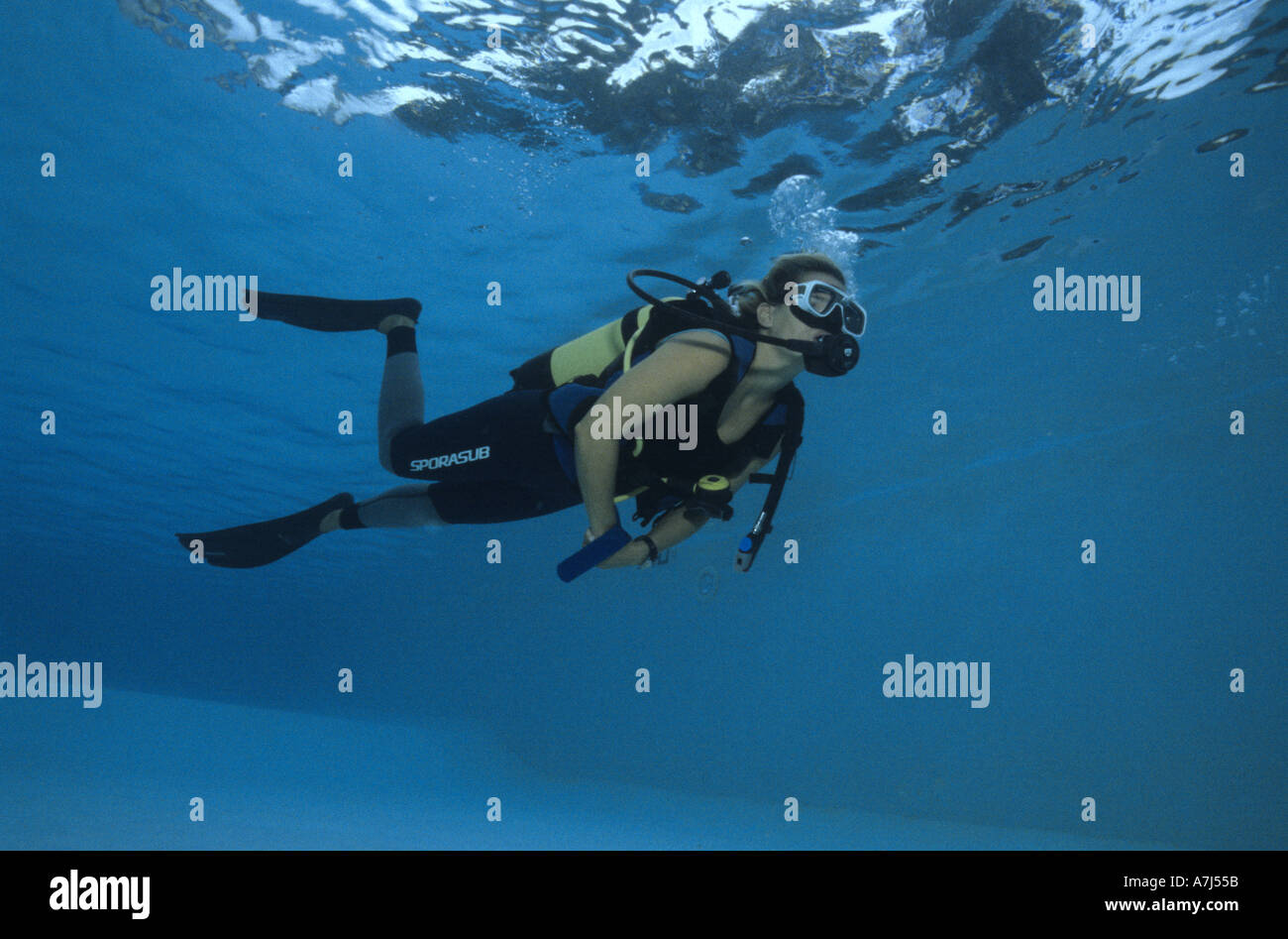 SCUBA diver training in swimming pool Stock Photo - Alamy