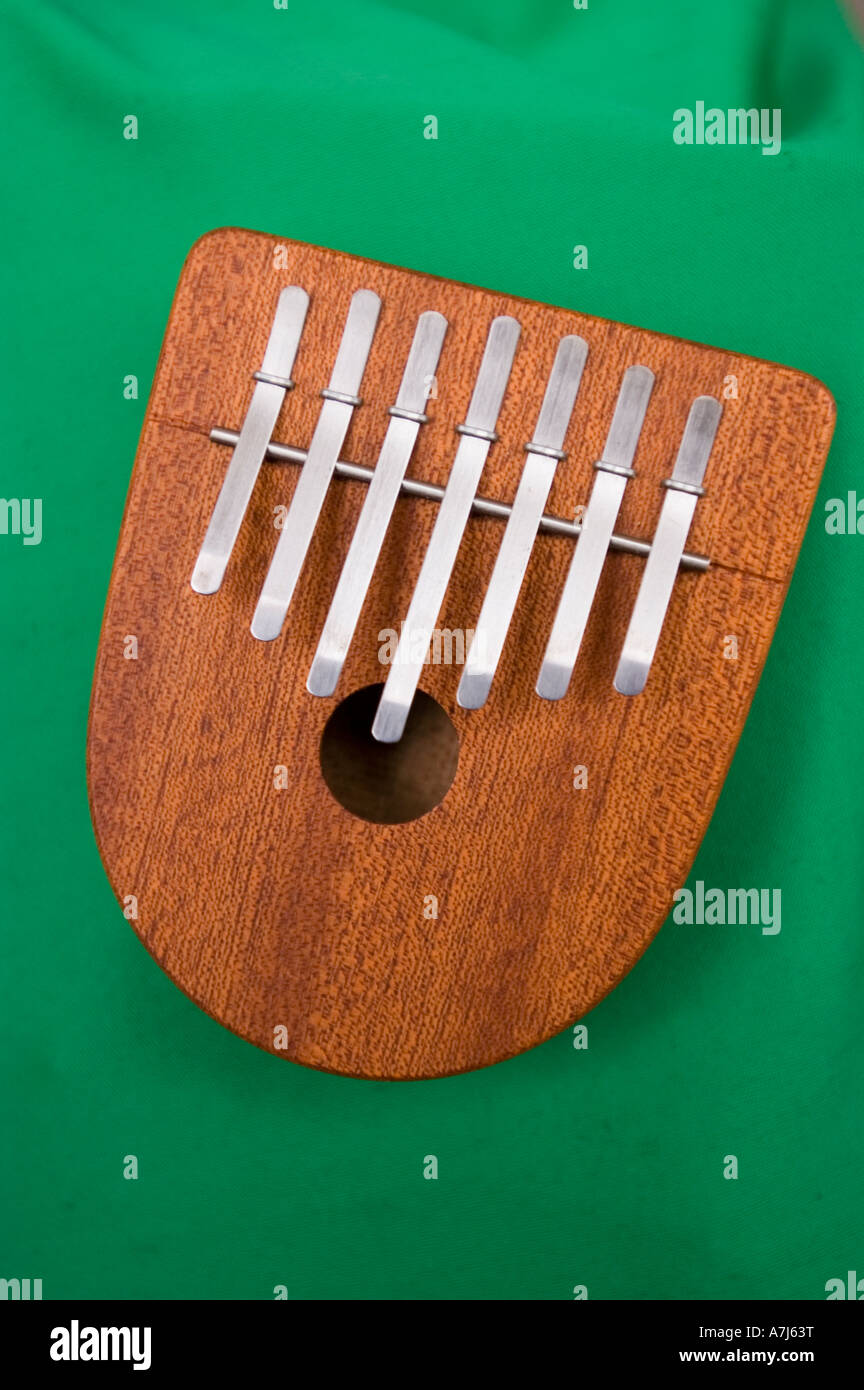 Kalimba musical instrument with green background Africa Stock Photo - Alamy