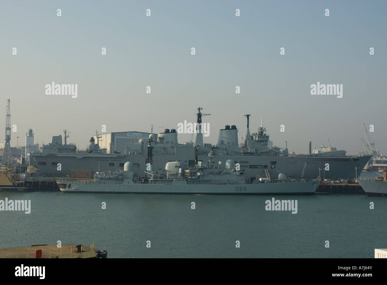 The aircraft carrier HMS Invincible and the detroyer HMS Exeter in ...