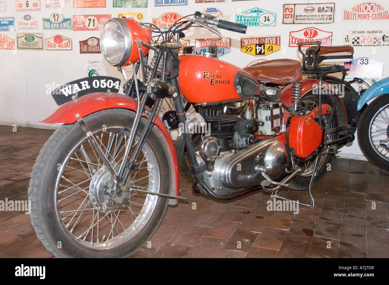 Red heritage Royal Enfield motorcycle in Warsaw Technology Museum ...