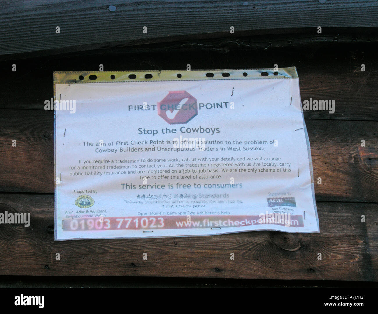 First Checkpoint organisation sign warning Stock Photo - Alamy