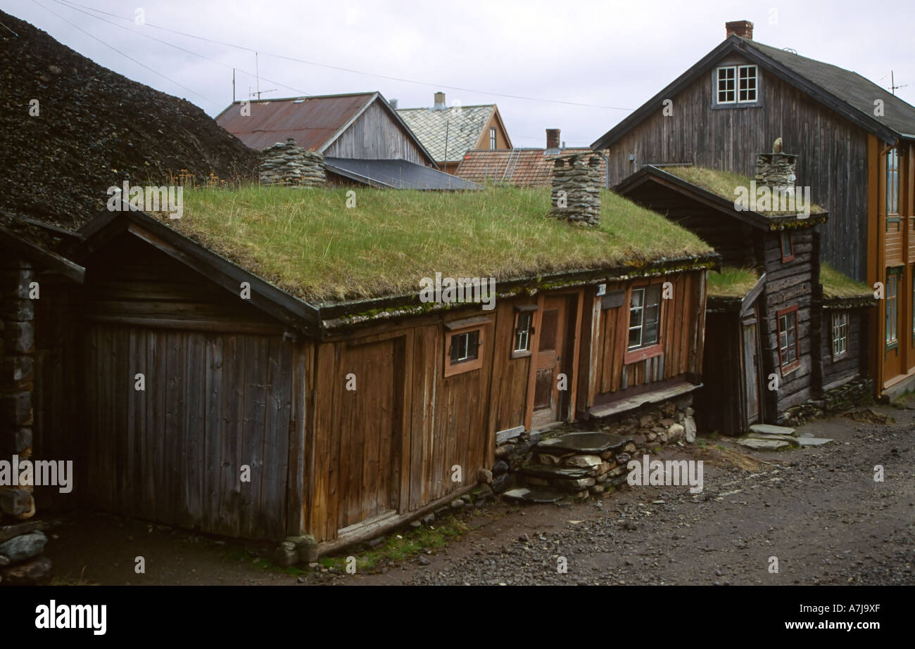 Timber houses with grass rooves in the former copper mining town of ...