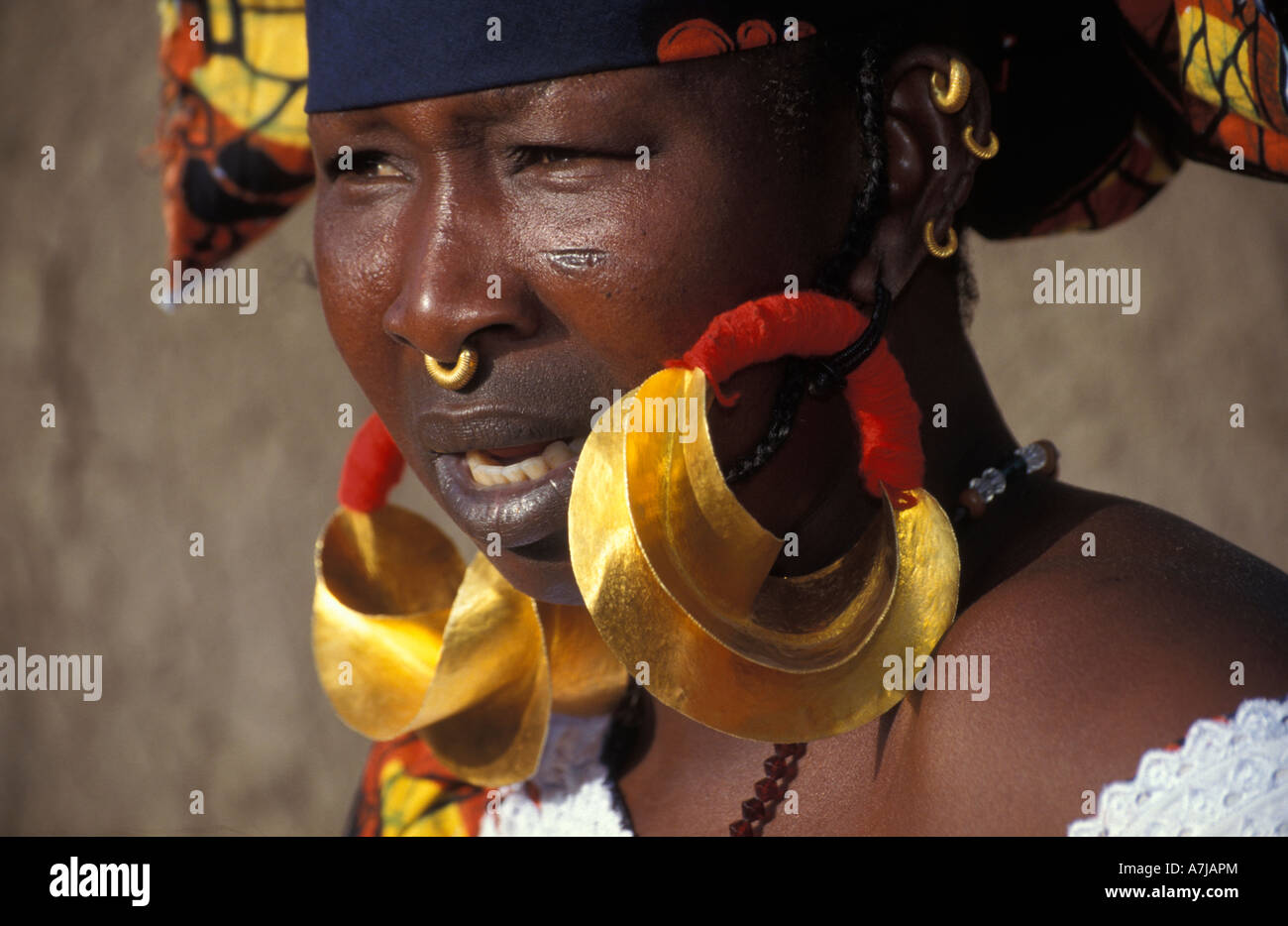 Peul or Fula woman with characteristic mouth tattoo wearing traditional ...