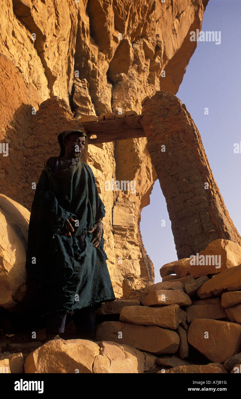 Hogon, spiritual leader in his carved cliff home, Ende village, Dogon ...