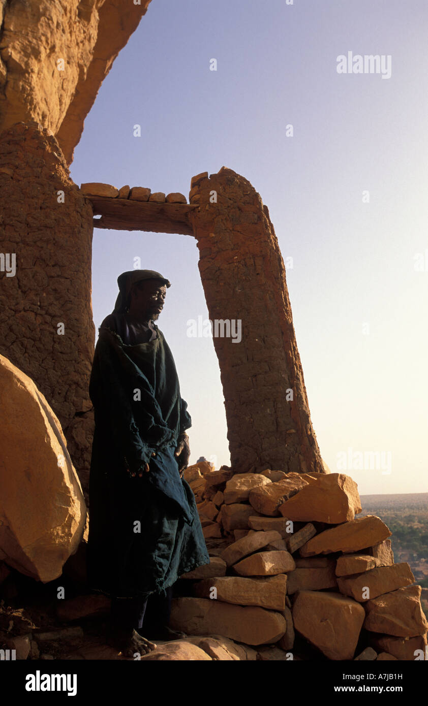Hogon, spiritual leader in his carved cliff home, Ende village, Dogon ...