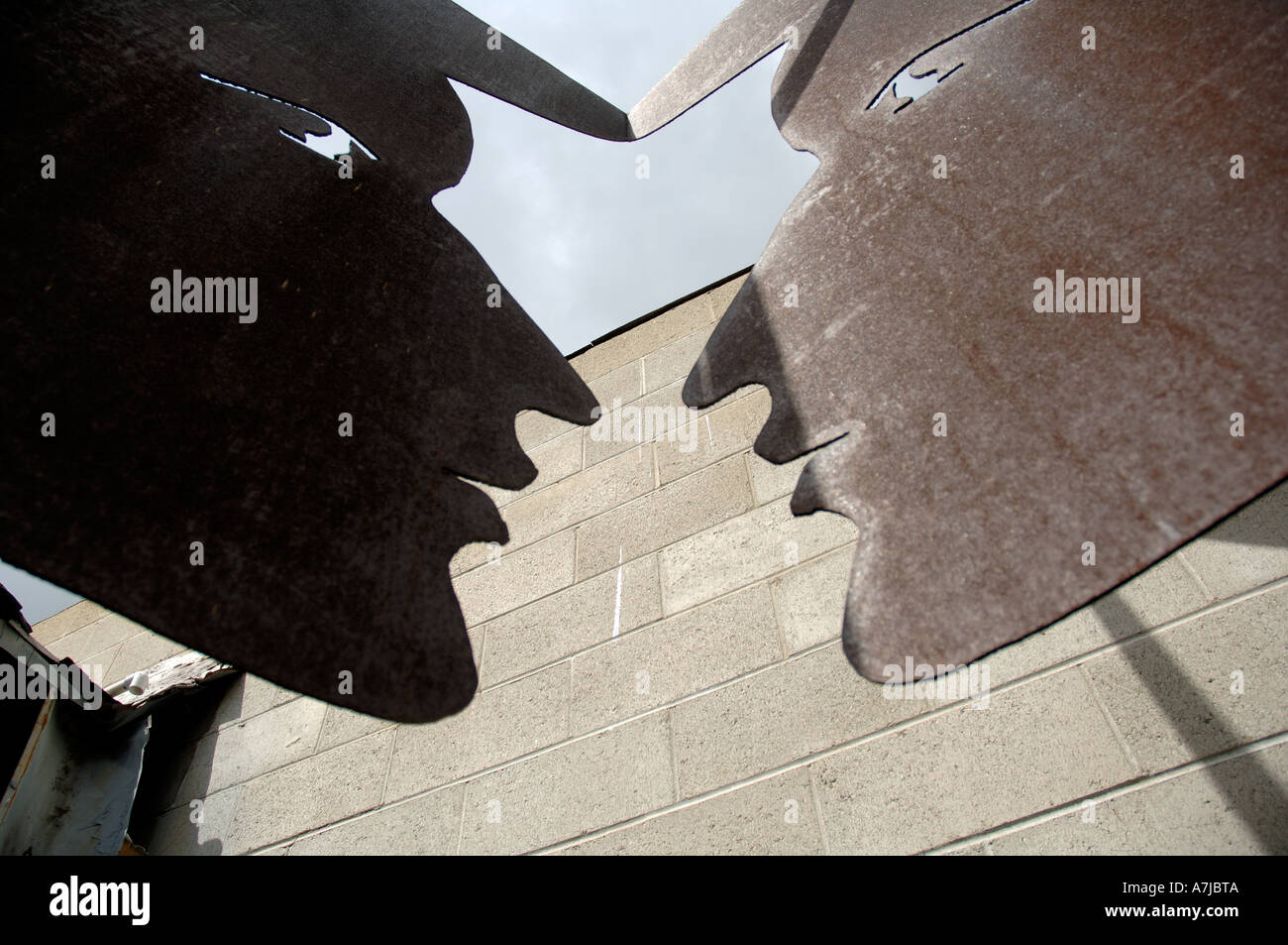 Human face figures created with metal sheets facing each other Stock ...