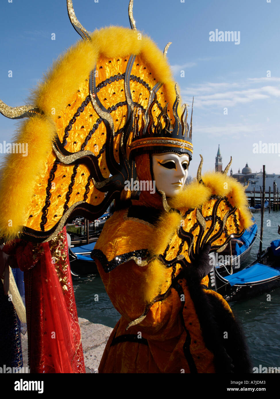man in sun costume Venice carnival Stock Photo - Alamy