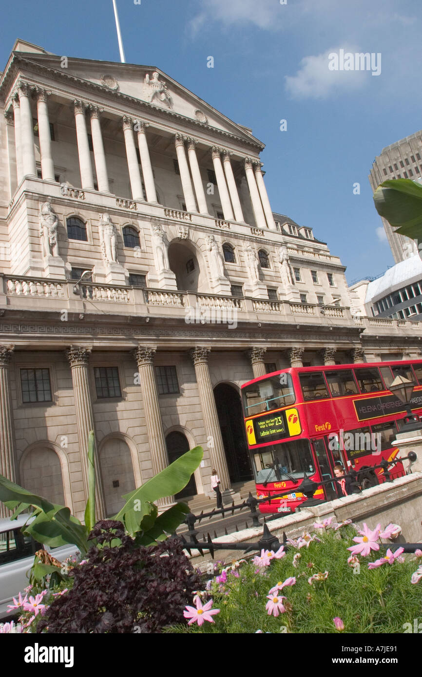 Red London bus in front of the Bank of England Stock Photo - Alamy