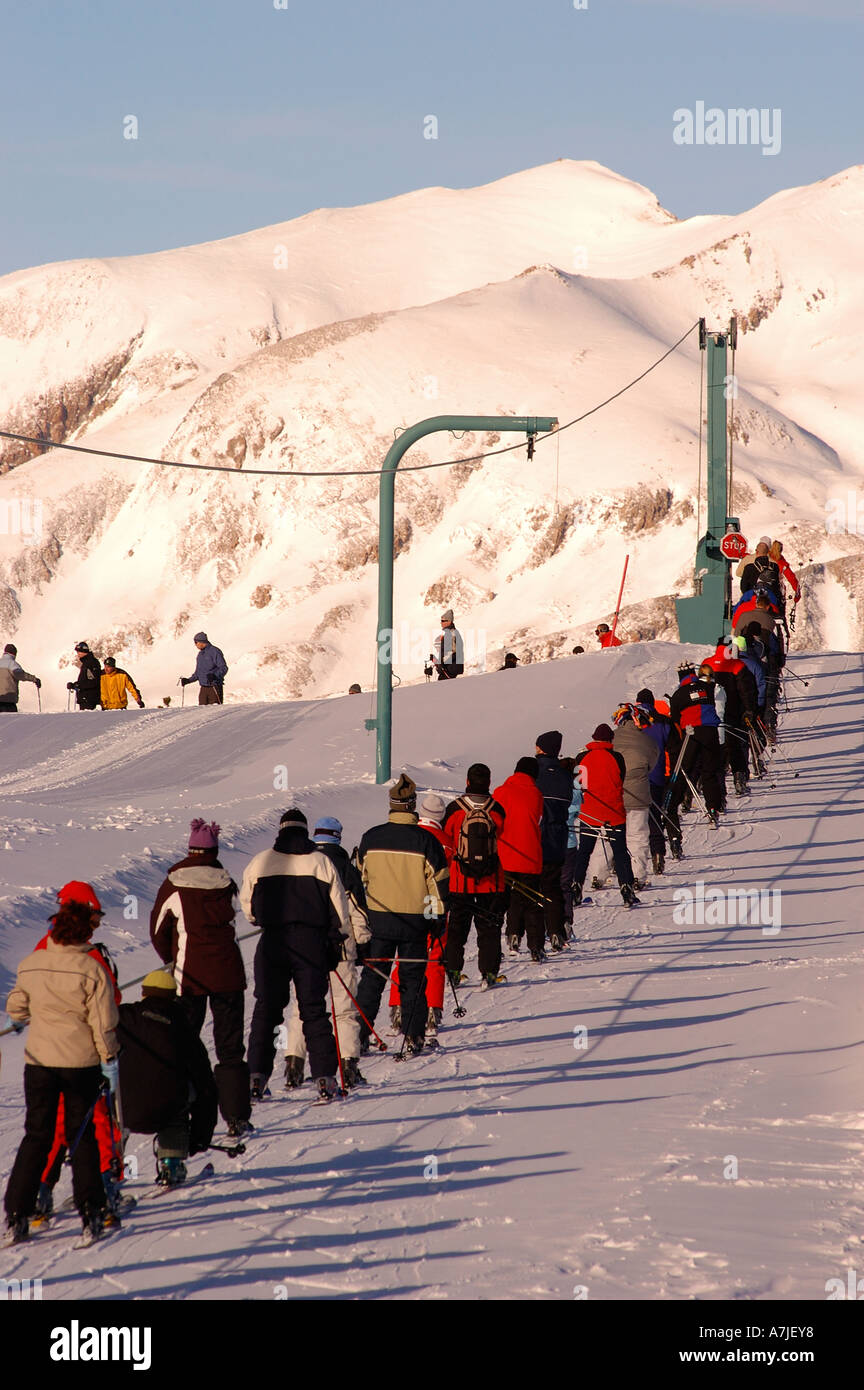 Group of skiers taking a ski lift, Soldeu ski resort, Andorra Stock ...