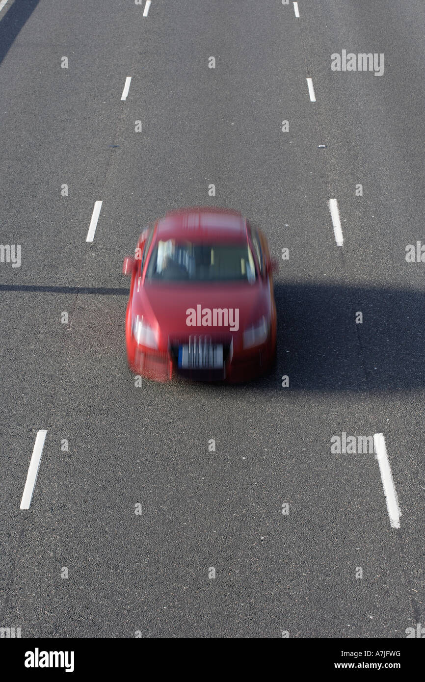 Red car road hi-res stock photography and images - Alamy