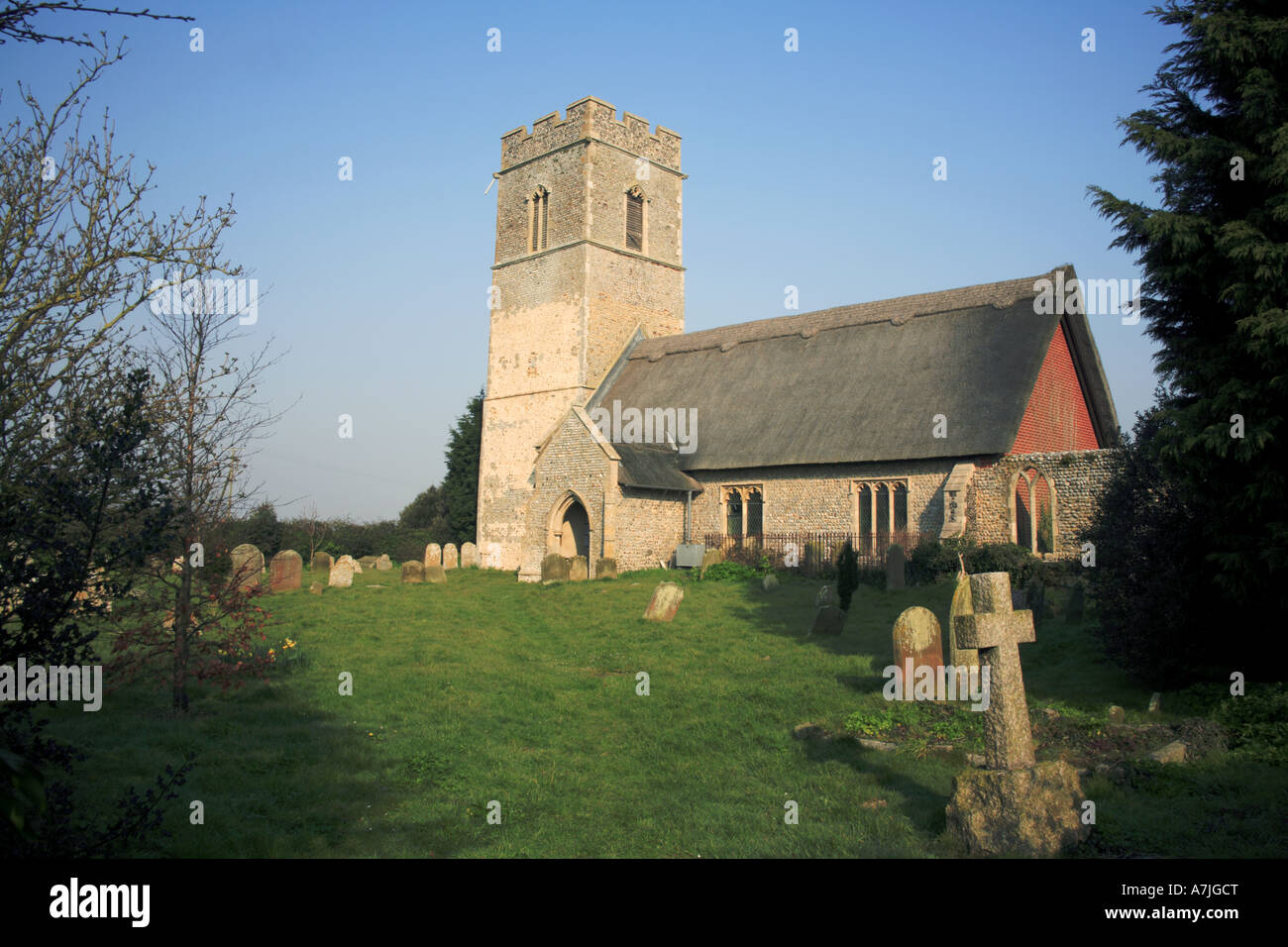 A view of the parish church of All Saints on the Norfolk coast at ...