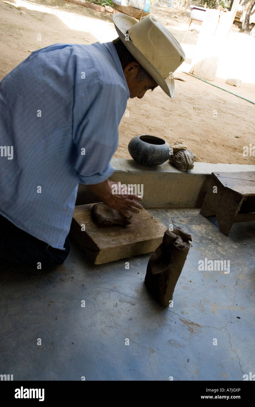 Old man build black pottery hi-res stock photography and images - Alamy