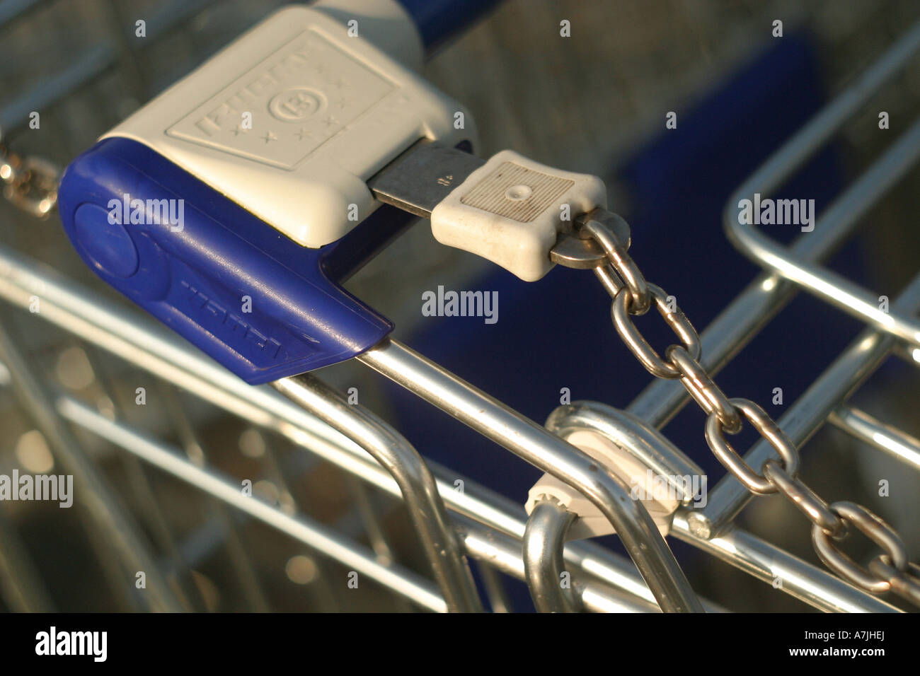 Shopping trolley coin lock Stock Photo - Alamy