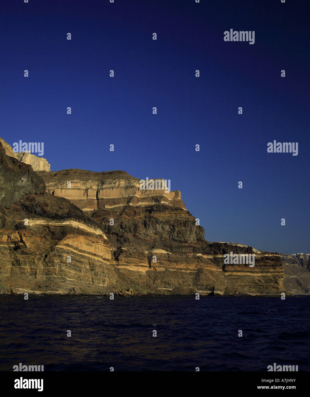 The colossal volcanic cliffs of Santorini Greece Stock Photo - Alamy