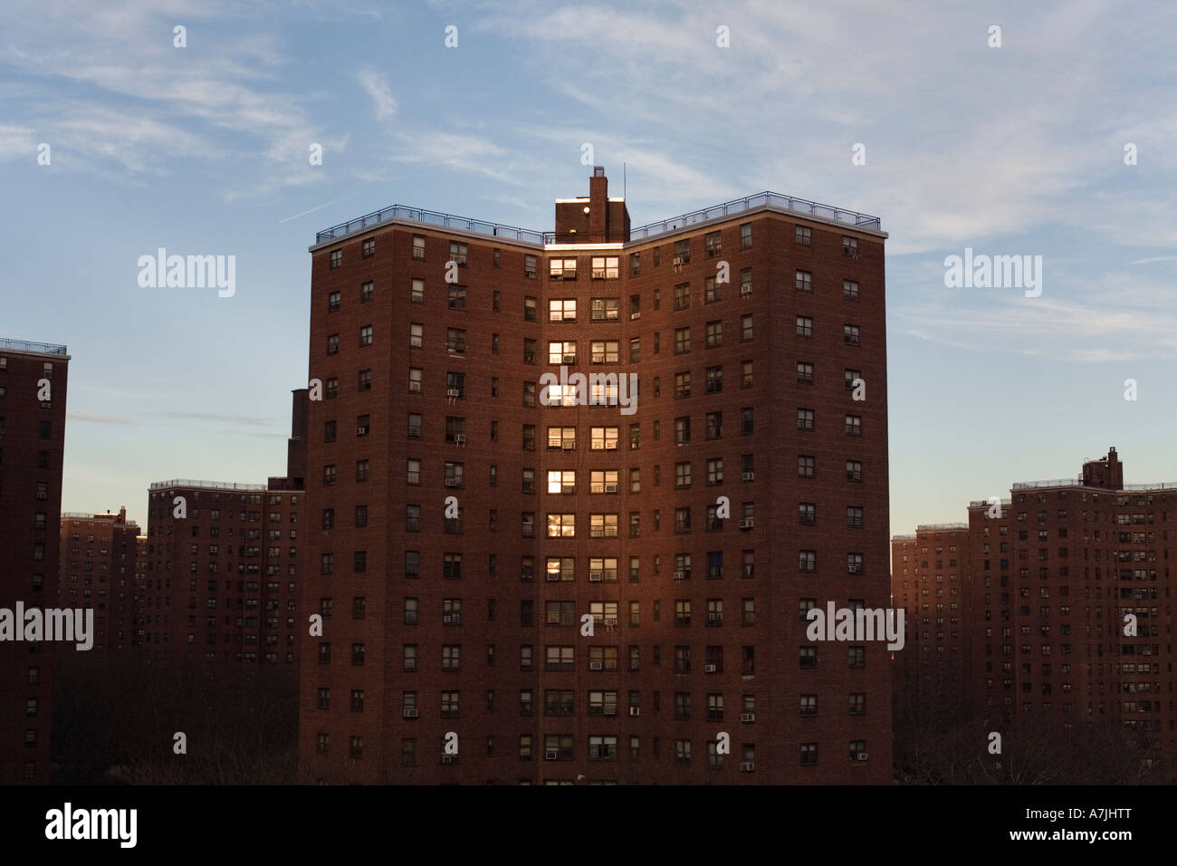 Apartment building at dusk Stock Photo - Alamy