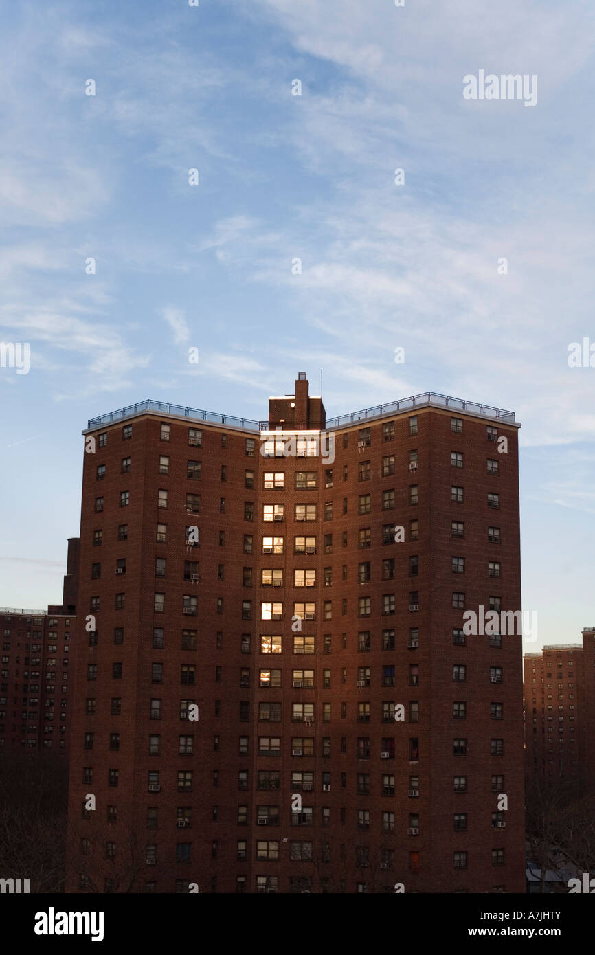 Apartment building at dusk Stock Photo - Alamy