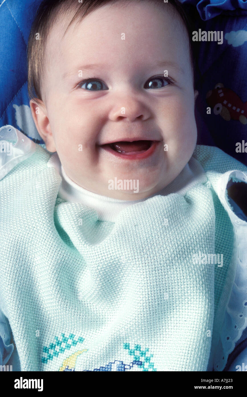 Seven month old baby smiling close up Stock Photo - Alamy