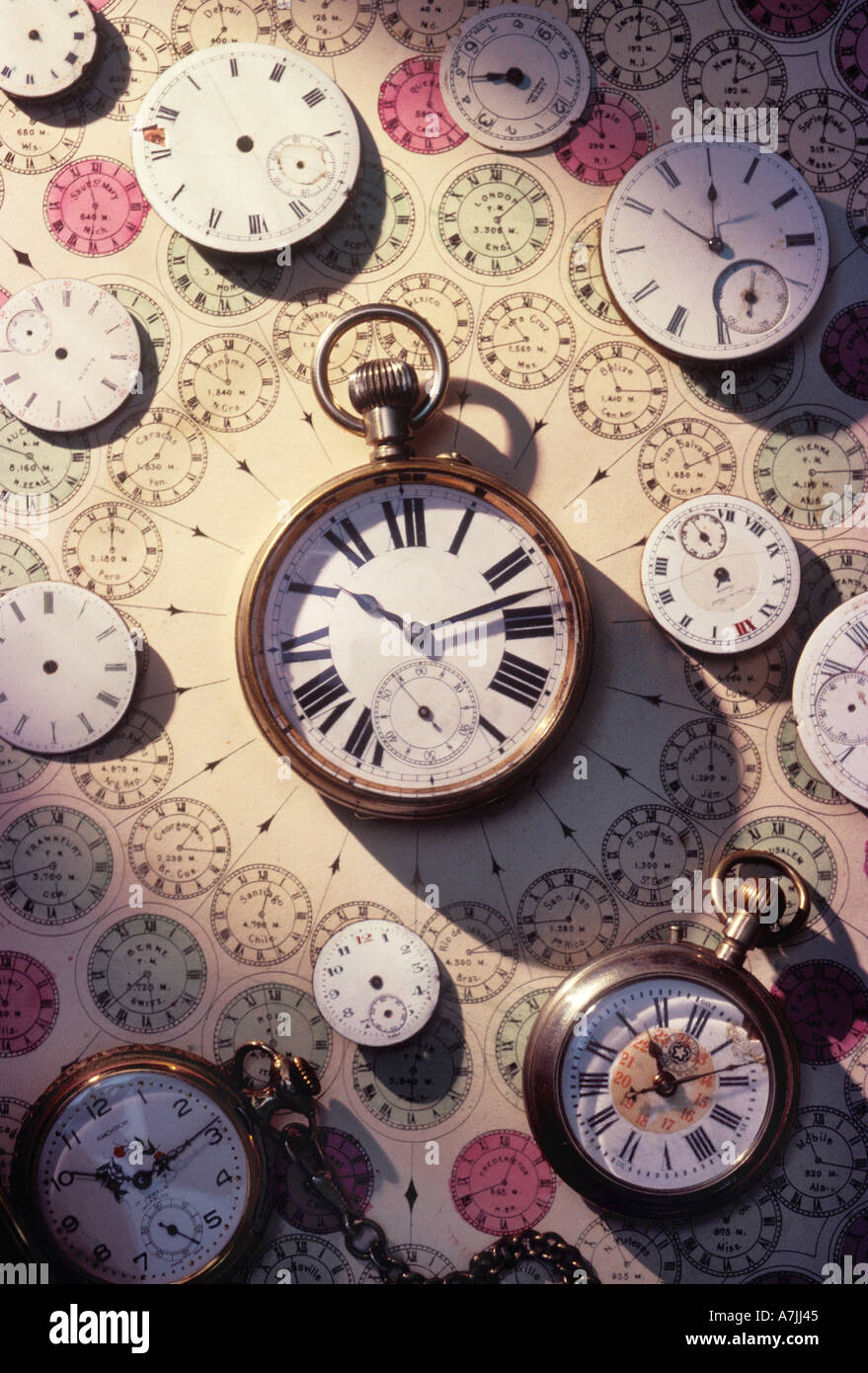 Pocket watch with old watch dials Stock Photo - Alamy