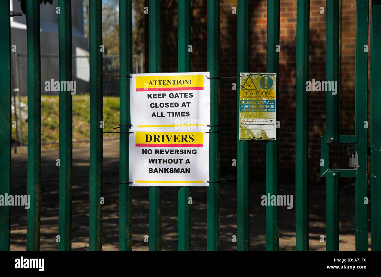 Warning sign on metal gates hi-res stock photography and images - Alamy