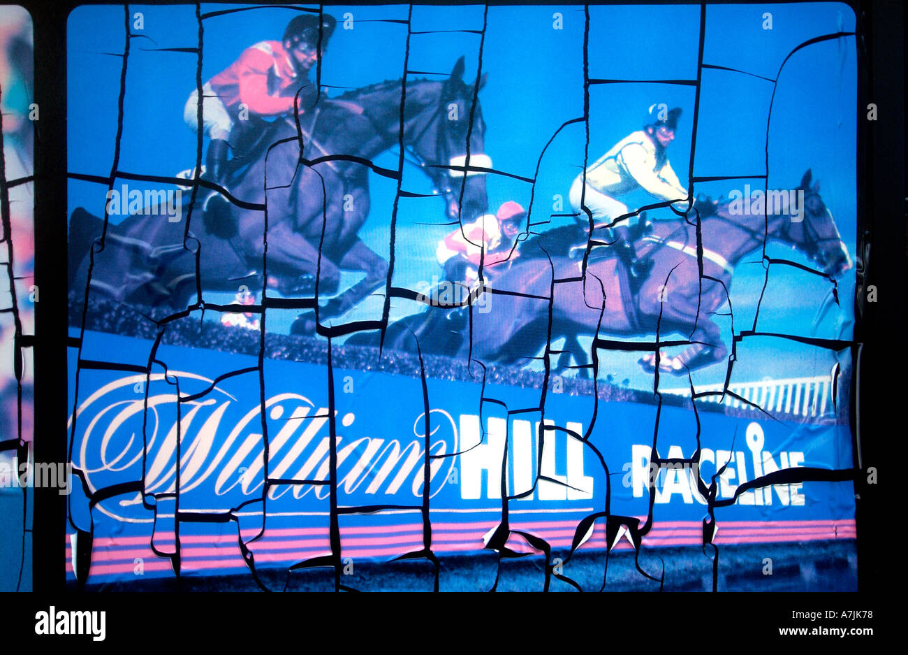 Sun faded display in window of William Hill betting shop Stock Photo ...